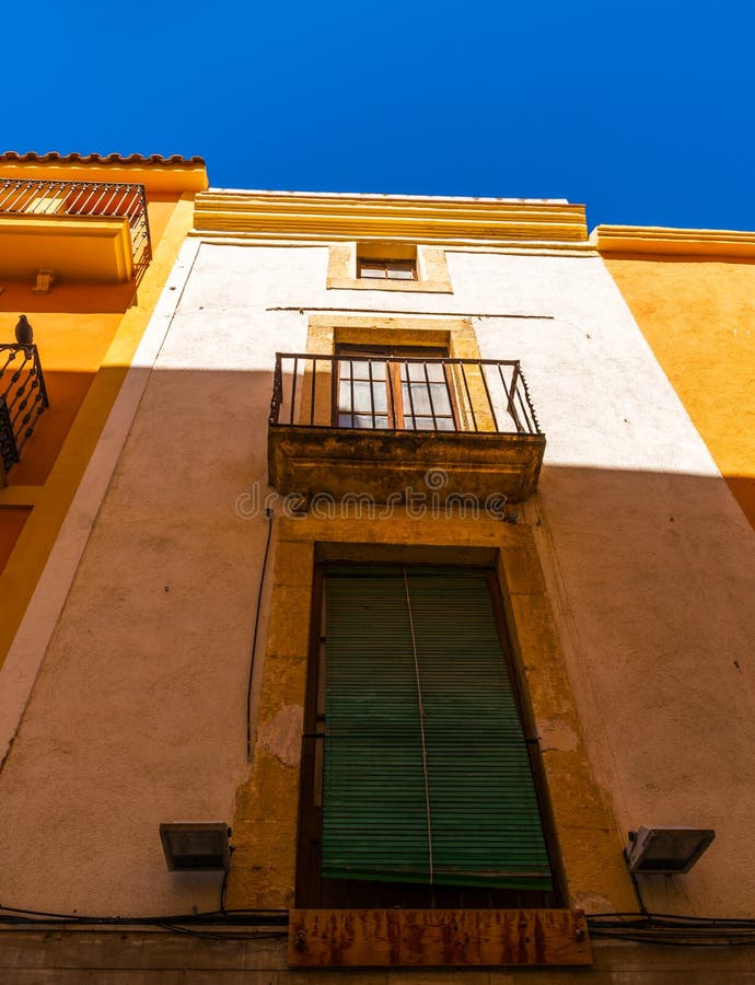 Stylish Balcony with a Metal Railing, Solid Architectural Element, a ...