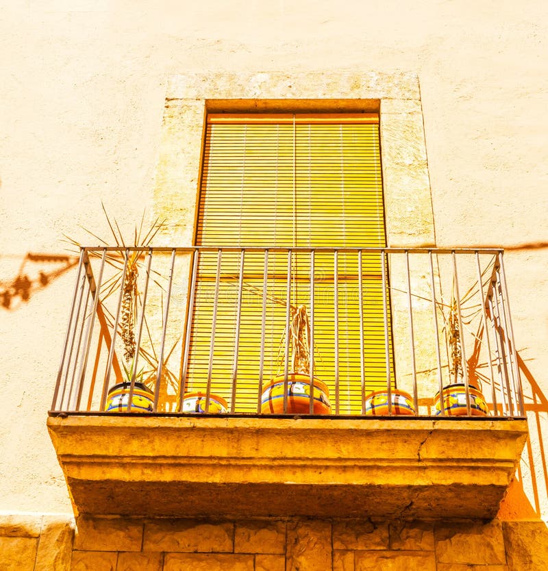 Stylish Balcony with a Metal Railing, Solid Architectural Element, a ...