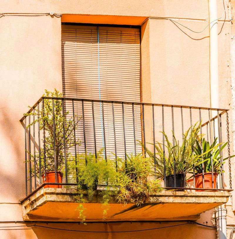 Stylish Balcony with a Metal Railing, Solid Architectural Element, a ...
