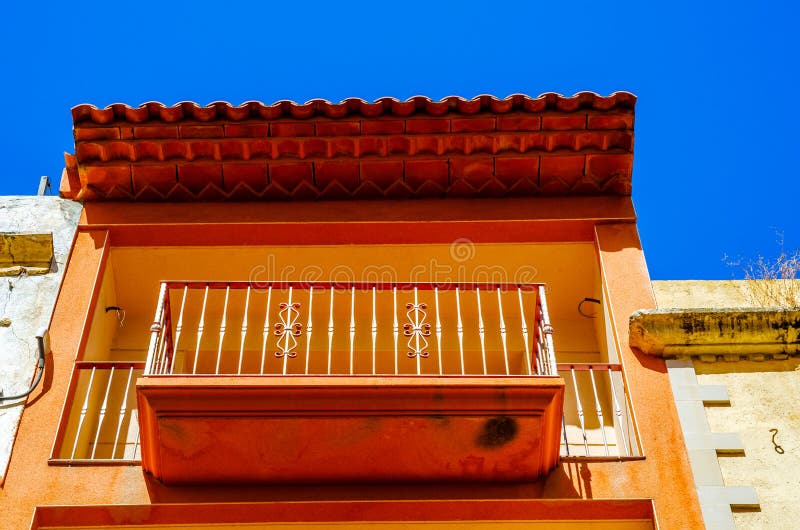 Stylish Balcony with a Metal Railing, Solid Architectural Element, a ...