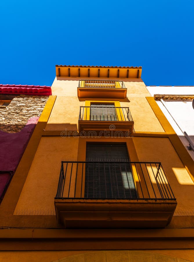 Stylish Balcony with a Metal Railing, Solid Architectural Element, a ...