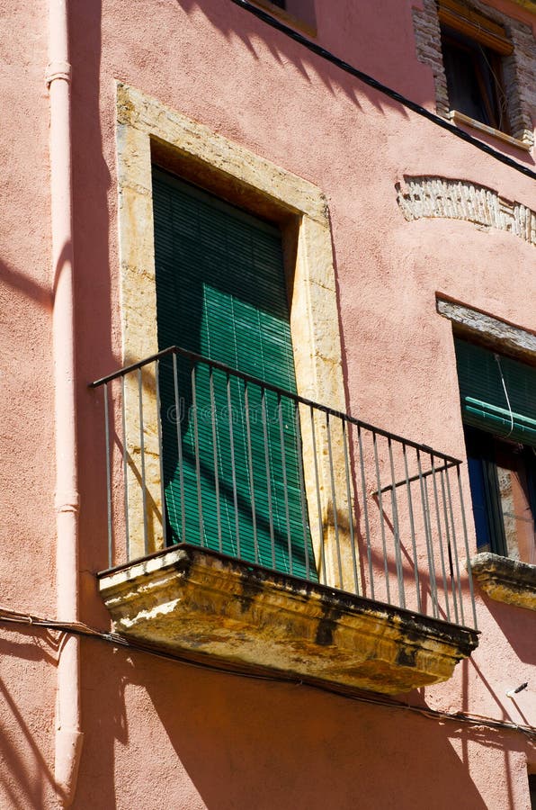 Stylish Balcony with a Metal Railing, Solid Architectural Element, a ...