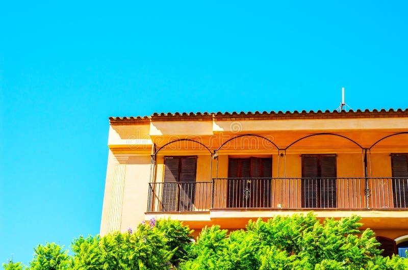 Stylish Balcony with a Metal Railing, Solid Architectural Element, a ...
