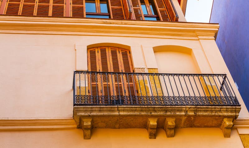 Stylish Balcony with a Metal Railing, Solid Architectural Element, a ...