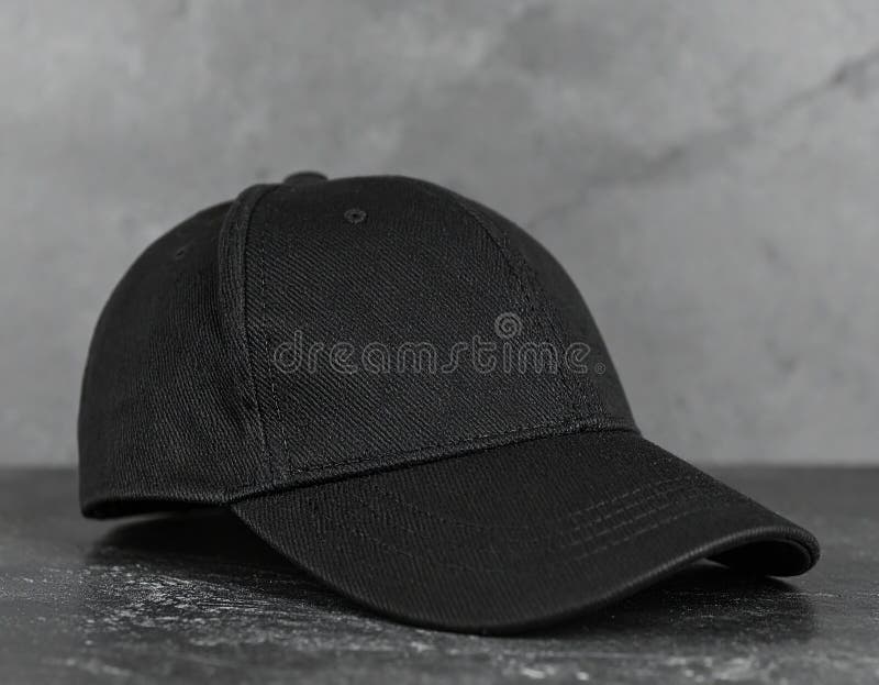 Stylish Baseball Cap on Dark Textured Table, Closeup. Mockup for Design ...