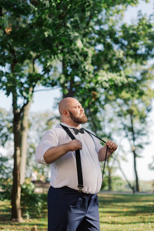 Stylish Bearded Fat Groom in the Park. Stock Image - Image of flower ...