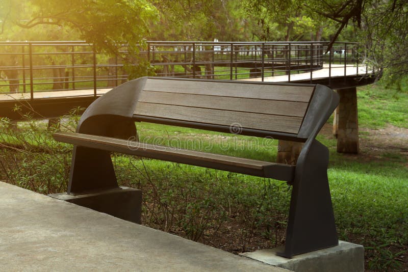 Stylish Bench Near Trees in Green Park Stock Image - Image of leisure ...