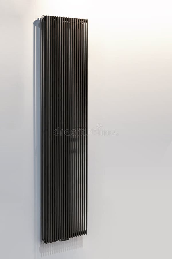 Stylish Black Vertical Long Heating Radiator on the Wall. Sophisticated ...