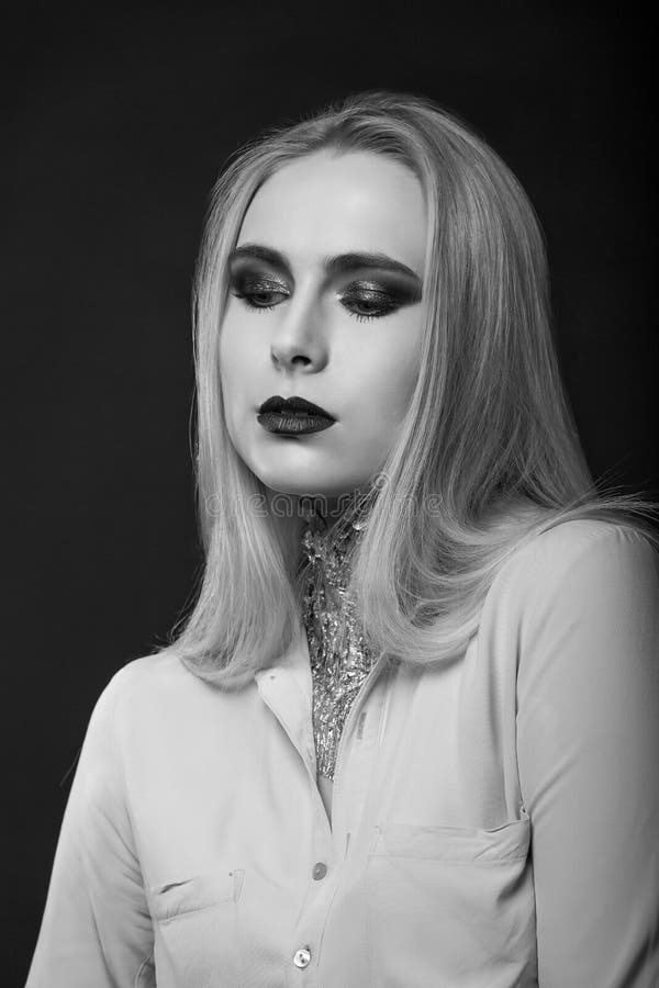 Lovely Young Lady Posing in the Shadow with Foil on Her Neck Stock ...