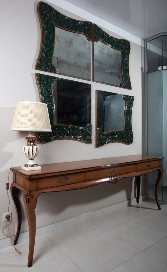 Stylish and Brand New Table with Lamp and Mirror Stock Image - Image of ...
