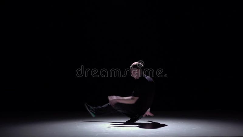 Dancer in Dark Suit Dancing Breakdance, on Black, Shadow, Slow Motion ...