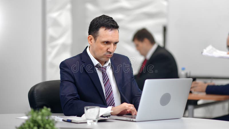 Stylish Busy Man Boss Typing Using Computer Pc at Workplace Coworkers ...