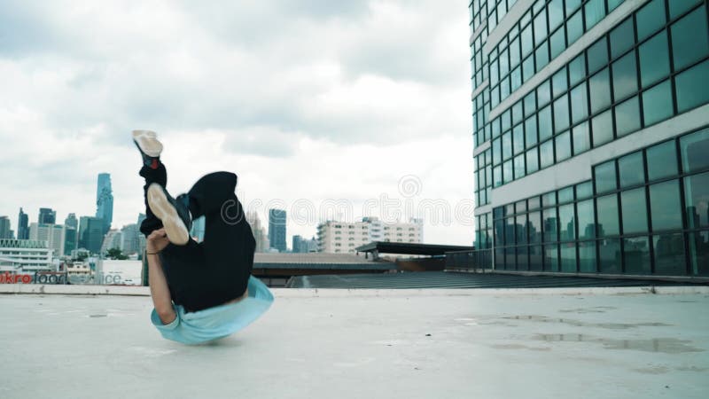 Stylish Caucasian Dancing Man Performing Break Dance at Skyscraper ...