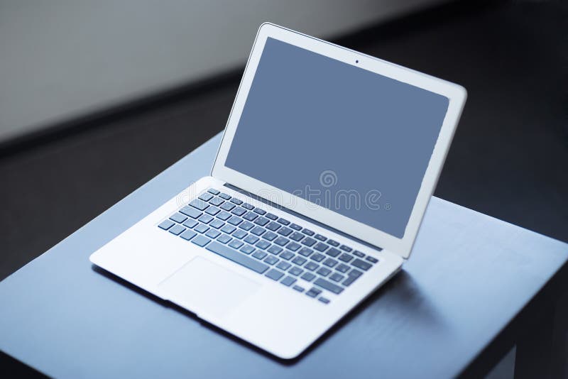 Stylish and Classy, the Laptop in the Workplace. Stock Image - Image of ...