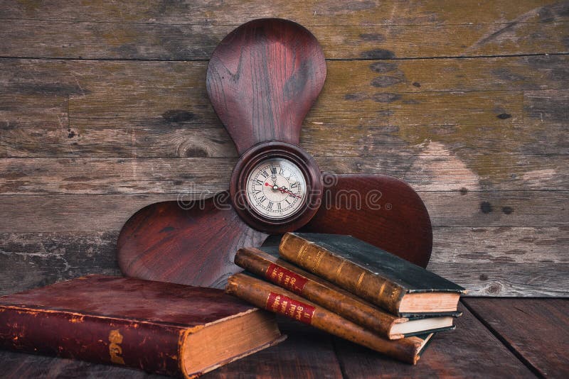 Stylish Clock and Old Books. Time of Memory Stock Image - Image of ...