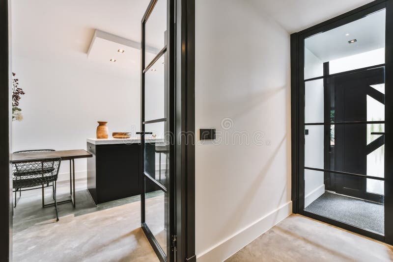 Stylish Corridor with Glass Doors in Black Frames Stock Photo - Image ...