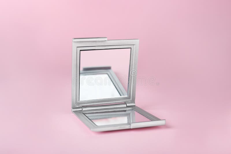Stylish Cosmetic Pocket Mirror on Pink Background Stock Image - Image ...