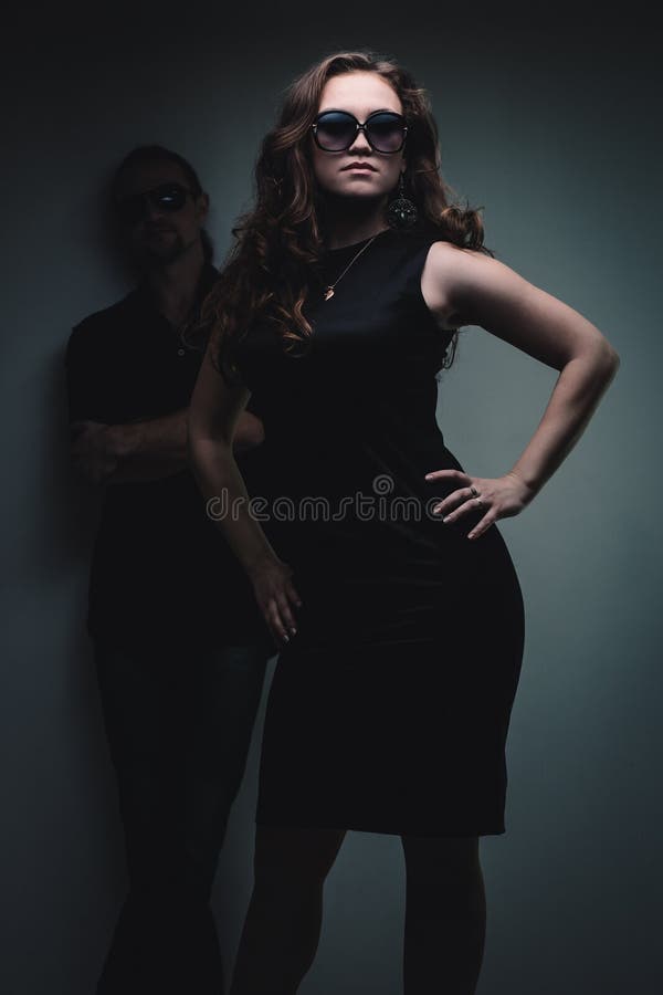 Fashion couple in low key stock photo. Image of portrait - 27692408