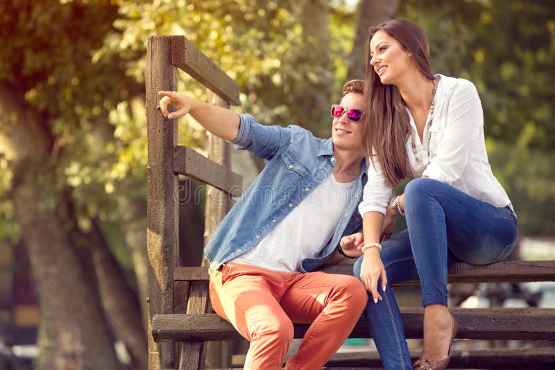 Stylish Couple Rest in City Park Stock Image - Image of person ...