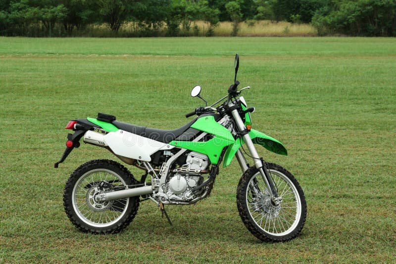 Stylish Cross Motorcycle on Green Grass Outdoors Stock Photo - Image of ...