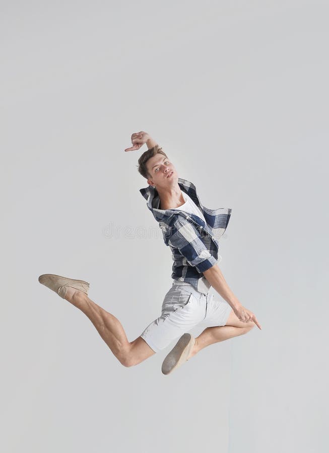 Stylish Dancer Man Jumping in Studio Stock Photo - Image of jumping ...