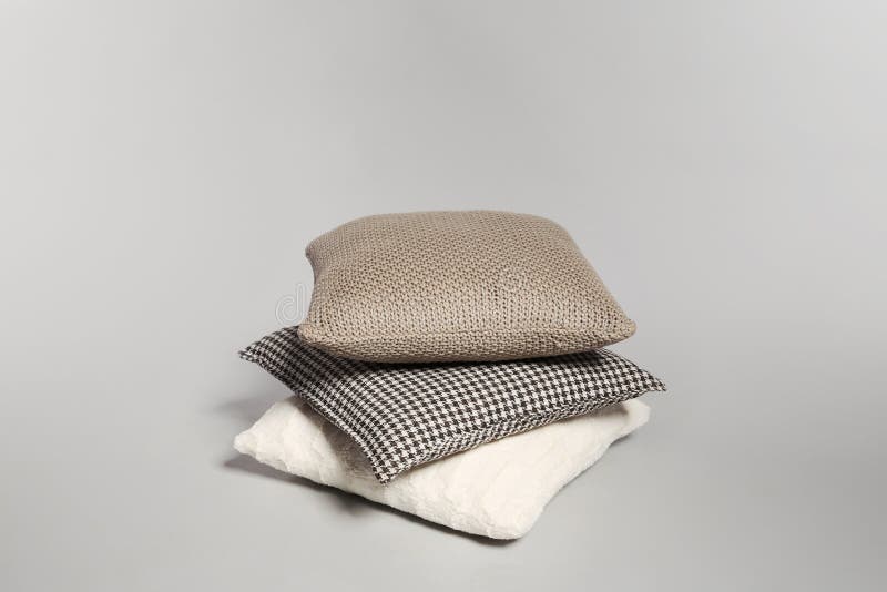 Stylish Decorative Pillows Stacked Stock Photo - Image of bedding, head ...