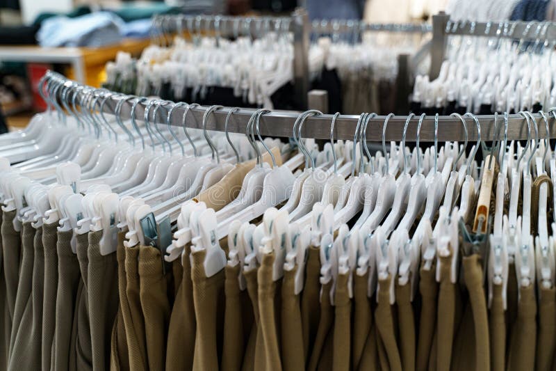 Stylish Display of Neatly Hung Clothing in a Retail Store Setting Stock ...