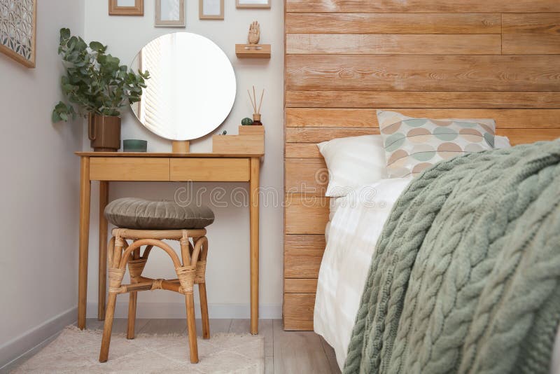 Stylish Dressing Table and Mirror Near White Wall in Bedroom. Interior ...