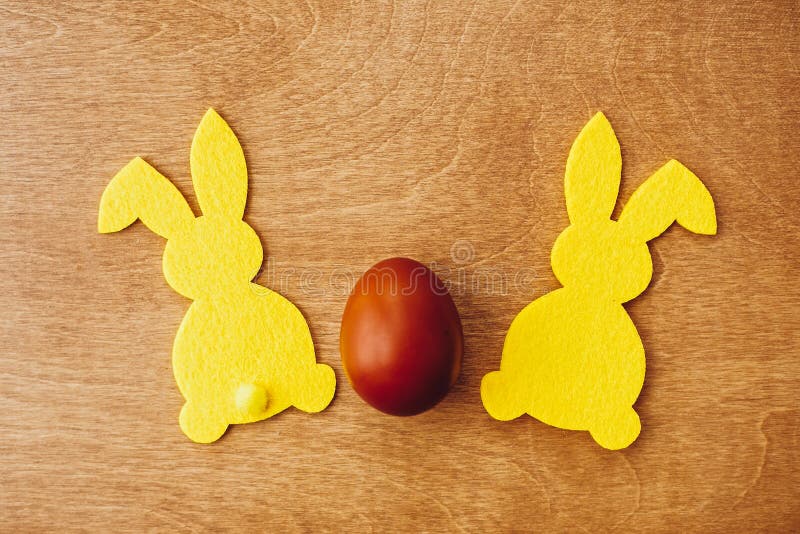 Stylish Easter Egg and Yellow Bunny on Rustic Wooden Table Flat Lay ...