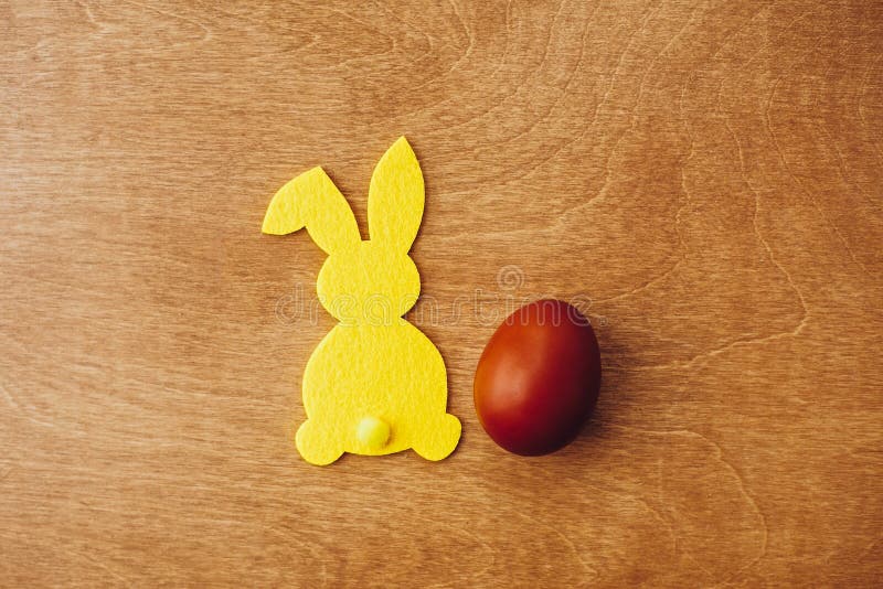 Stylish Easter Egg and Yellow Bunny on Rustic Wooden Table Flat Lay ...