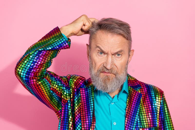 Stylish Eccentric Elderly Man in a Vibrant Disco Jacket Posing with Charisma Against a Pink ...