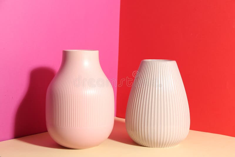 Stylish Empty Ceramic Vases on Color Background Stock Photo - Image of ...