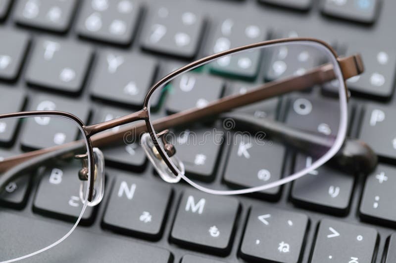 Stylish Eyesight Glasses on Keyboard Stock Image - Image of button ...