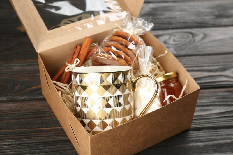 Stylish Gift Set in Box on Dark Wooden Table Stock Photo - Image of ...