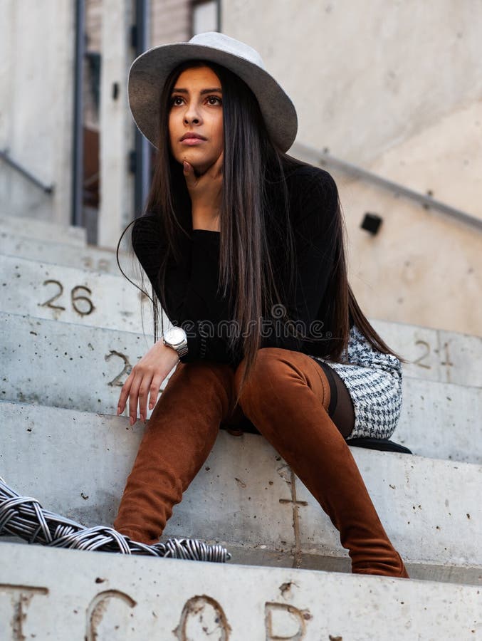 Stylish Girl Modelsitting on the Steps of the Building Stock Image ...