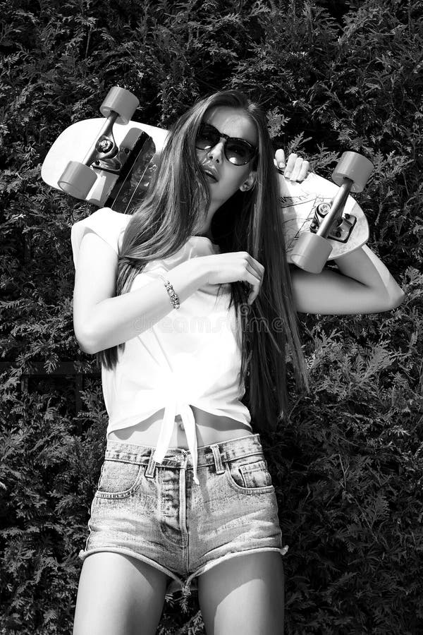 Stylish Girl in Sunglasses Poses with Longboard of Stock Image - Image ...