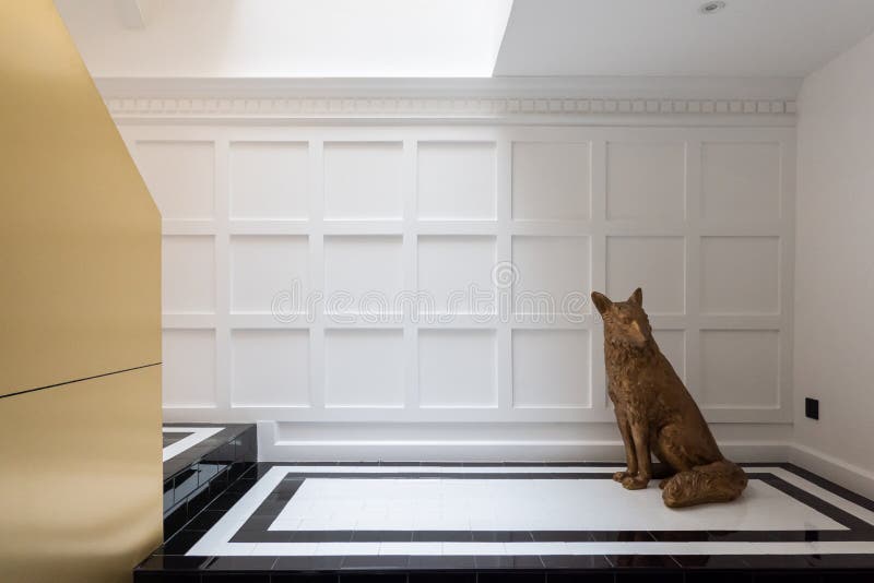Stylish Gold Staircase in Modern Classic Interior with Gold Sculpture ...