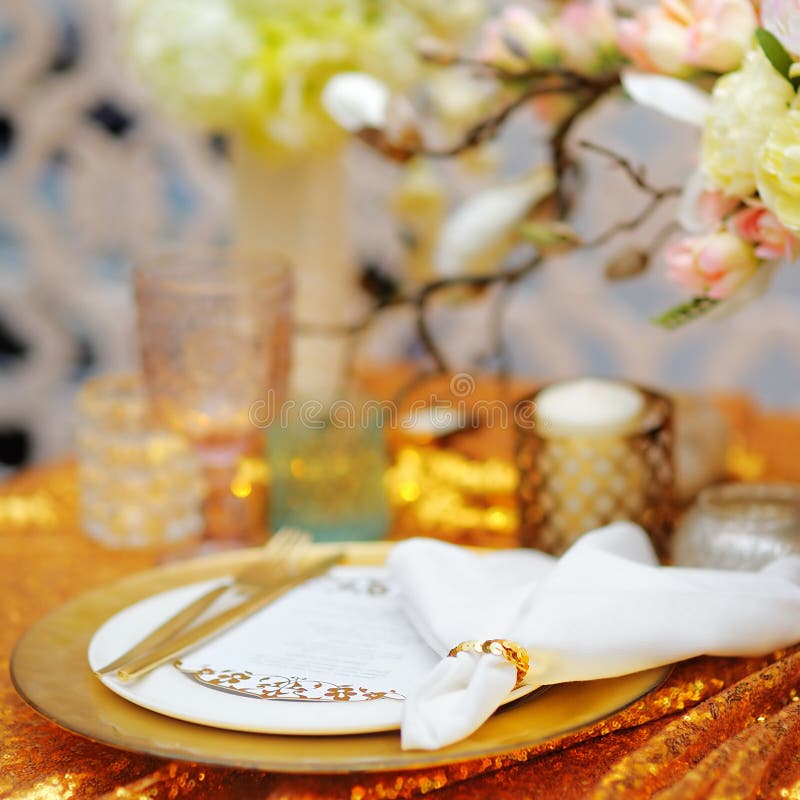 Stylish gold table set stock image. Image of china, interior - 52321125