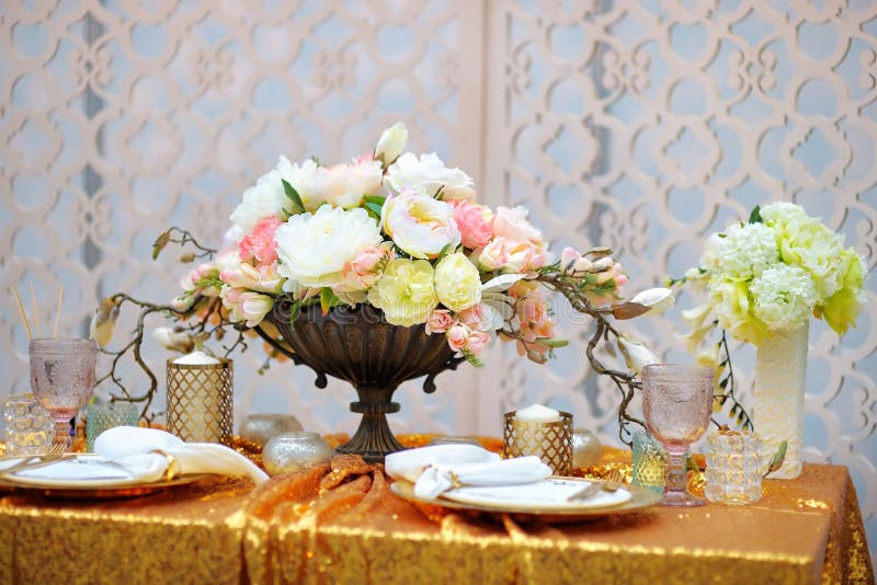 Stylish golden table set stock photo. Image of indoors - 51648520