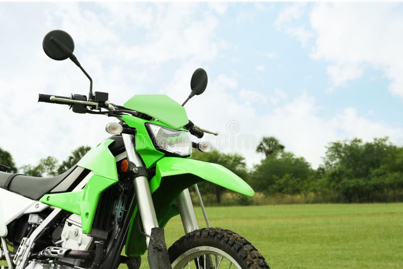 Stylish Green Cross Motorcycle Outdoors, Space for Text Stock Image ...