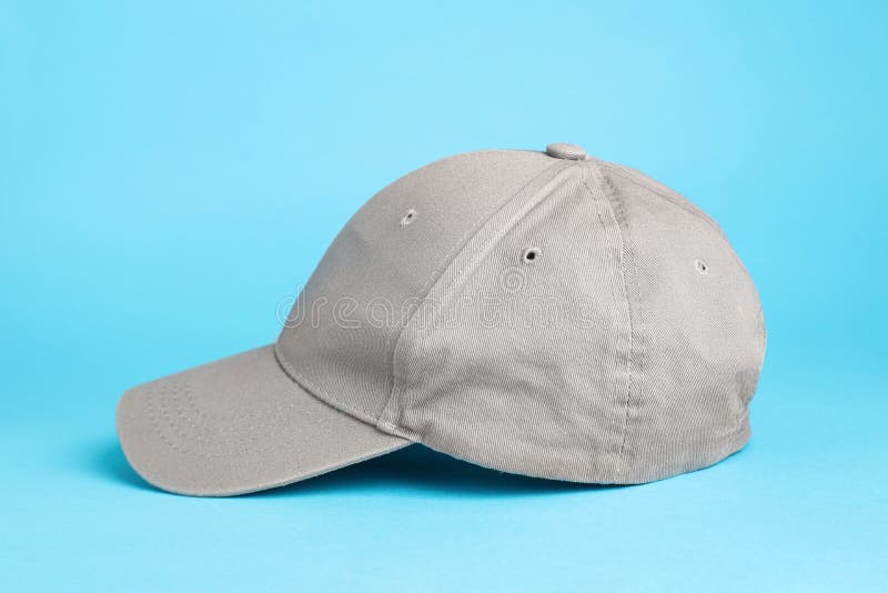 Stylish Grey Baseball Cap on Light Blue Background Stock Photo - Image ...