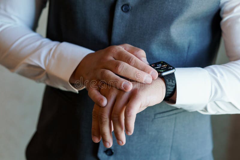 Stylish Groom Checking Time on Smartwatch before Wedding Ceremony Stock ...