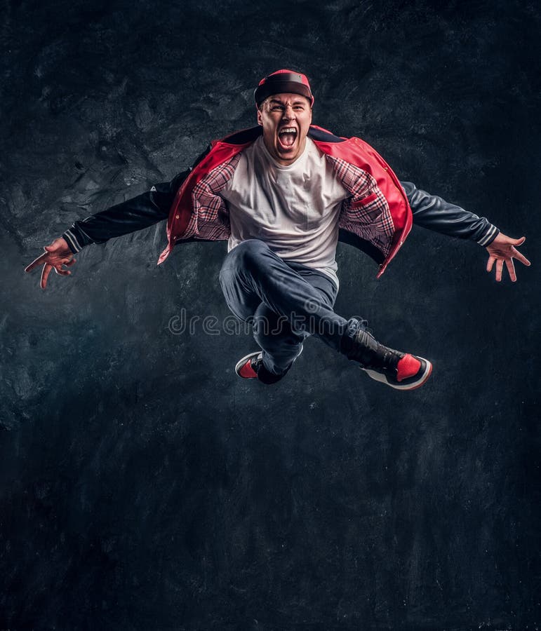 Stylish Guy Performs Breakdance Acrobatic Elements. Stock Image - Image ...