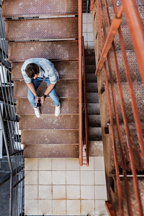 Stylish Guy Using Smartphone on Stairs Stock Image - Image of cute ...