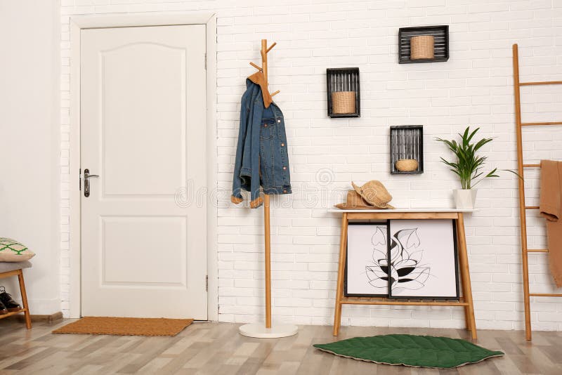 Stylish Hallway Interior with Hanger Stand Stock Photo - Image of door ...