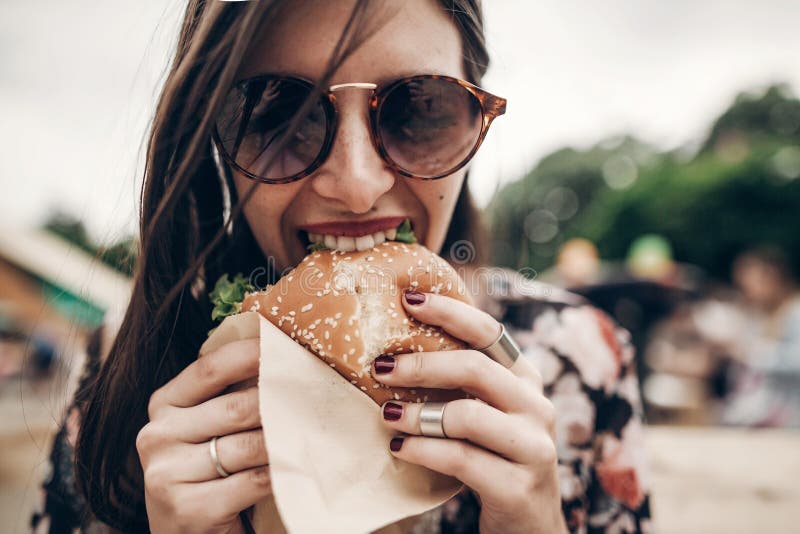 Big Juicy Burger in Hand. Stylish Hipster Woman Holding Yummy Ch Stock ... Big Juicy Burger in Hand. Stylish Hipster Woman Holding Yummy Ch Stock ...