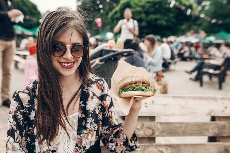 Stylish Hipster Woman In Sunglasses With Red Lips Holding Juicy Stock