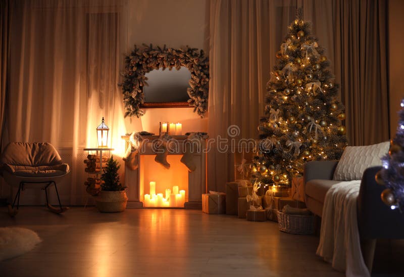Stylish Interior with Christmas Tree and Decorative Fireplace at Night ...