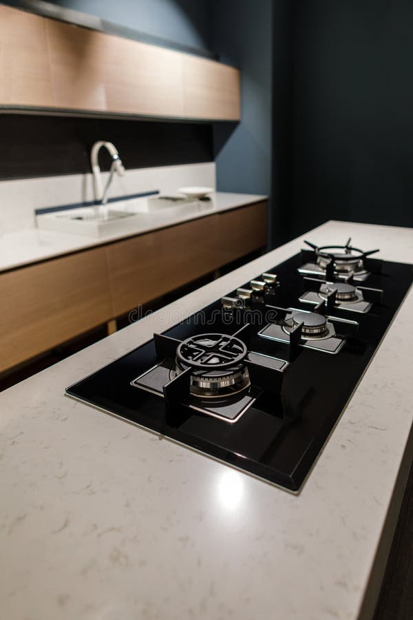 Stylish Kitchen with with Elegant Shiny Table and Stove Stock Photo ...