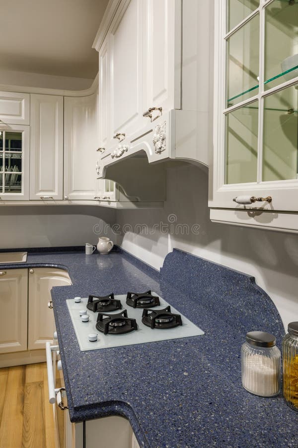 Stylish Kitchen with Elegant Stone Counter and Stove Stock Image ...
